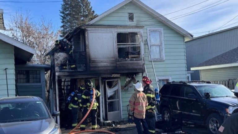 Officers use ladder found nearby to rescue Lake Geneva resident from ...